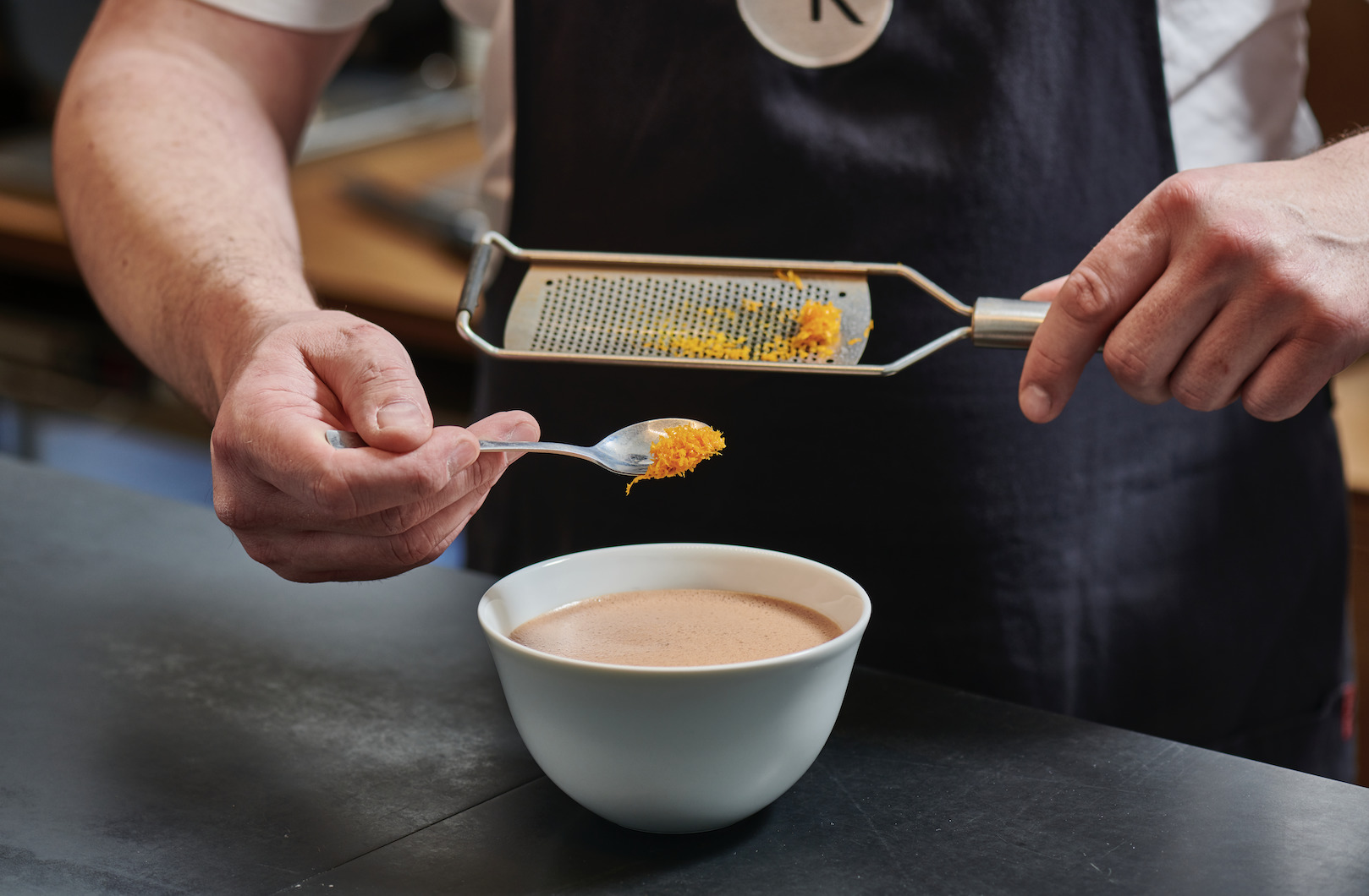 Knoops in London expertly crafting chocolate drinks